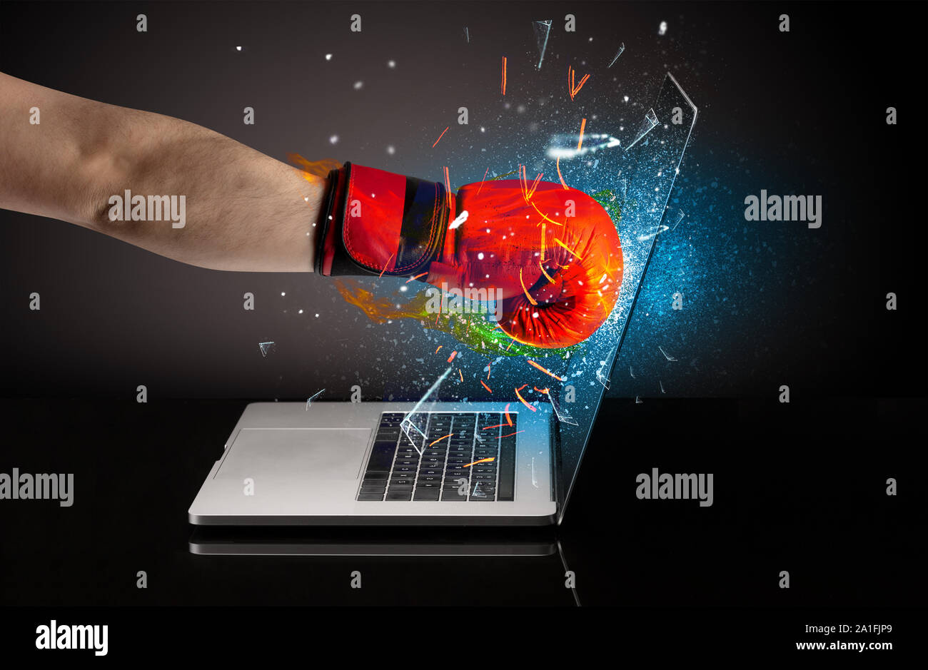 Firing hand hitting strongly laptop screen glass Stock Photo - Alamy