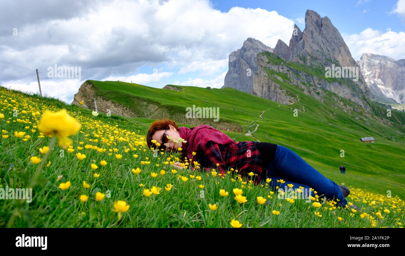Beautiful woman laying down flowers hi-res stock photography and images ...