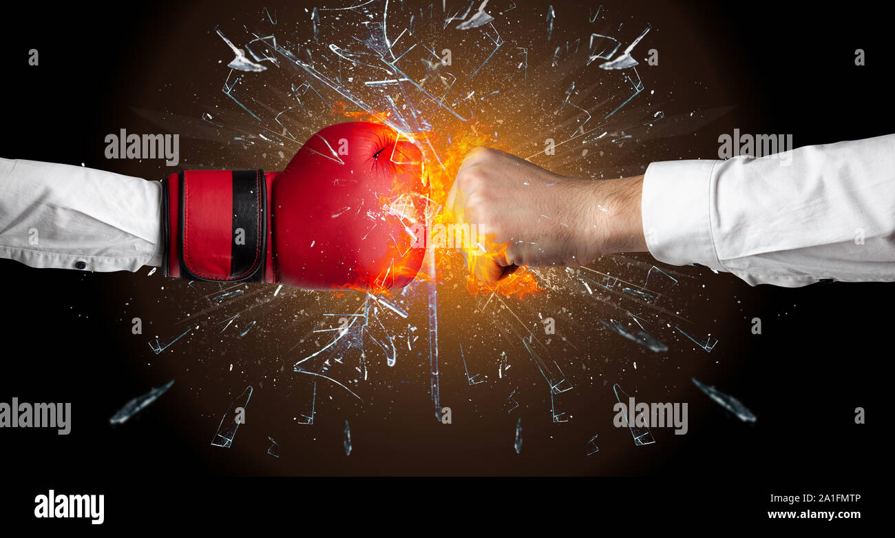 Two hands fighting and breaking a glass into small pieces Stock Photo ...