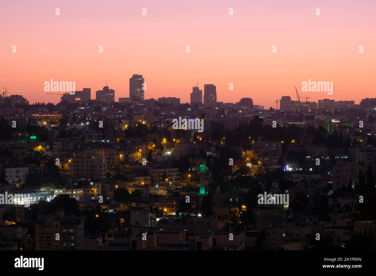 View at twilight of the skyline of west Jerusalem across Sheikh Jarrah ...