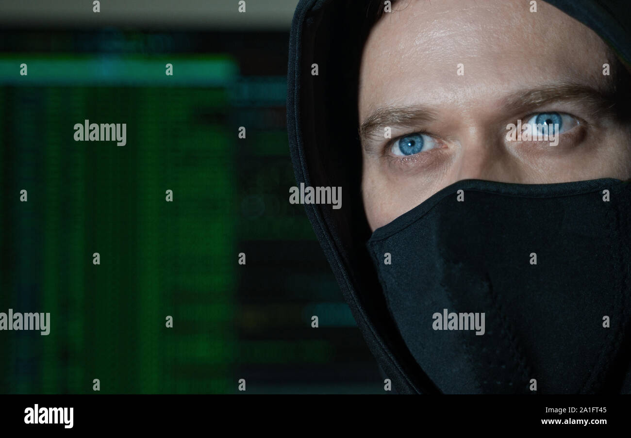 Man anonymous mask hacking binary hi-res stock photography and images ...