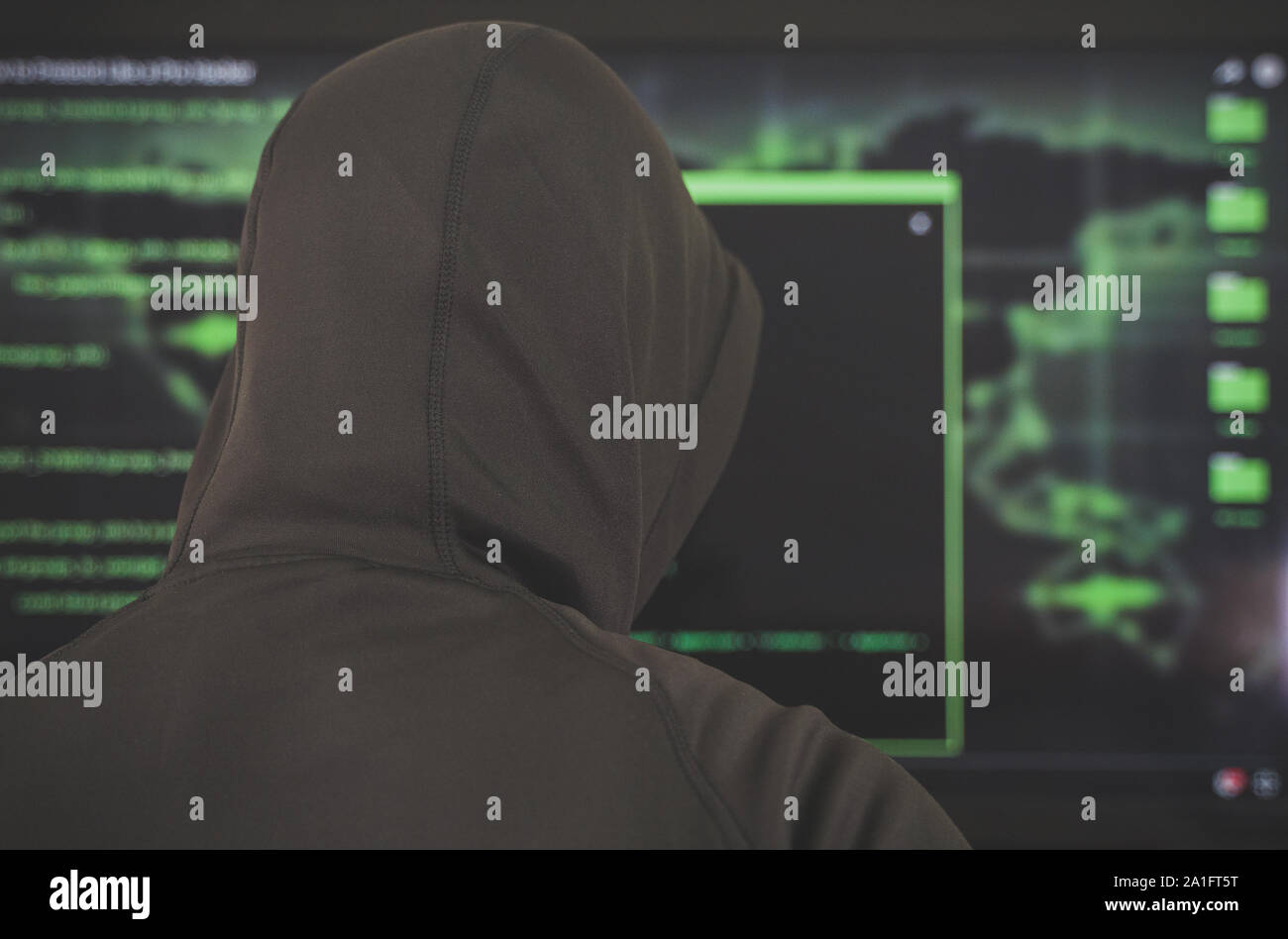 Hacker in black hoodie. Hacking and internet security concept Stock ...