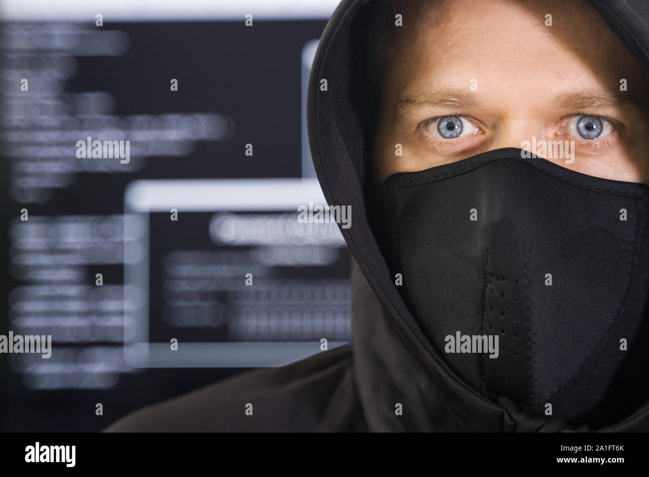 Man anonymous mask hacking binary hi-res stock photography and images ...