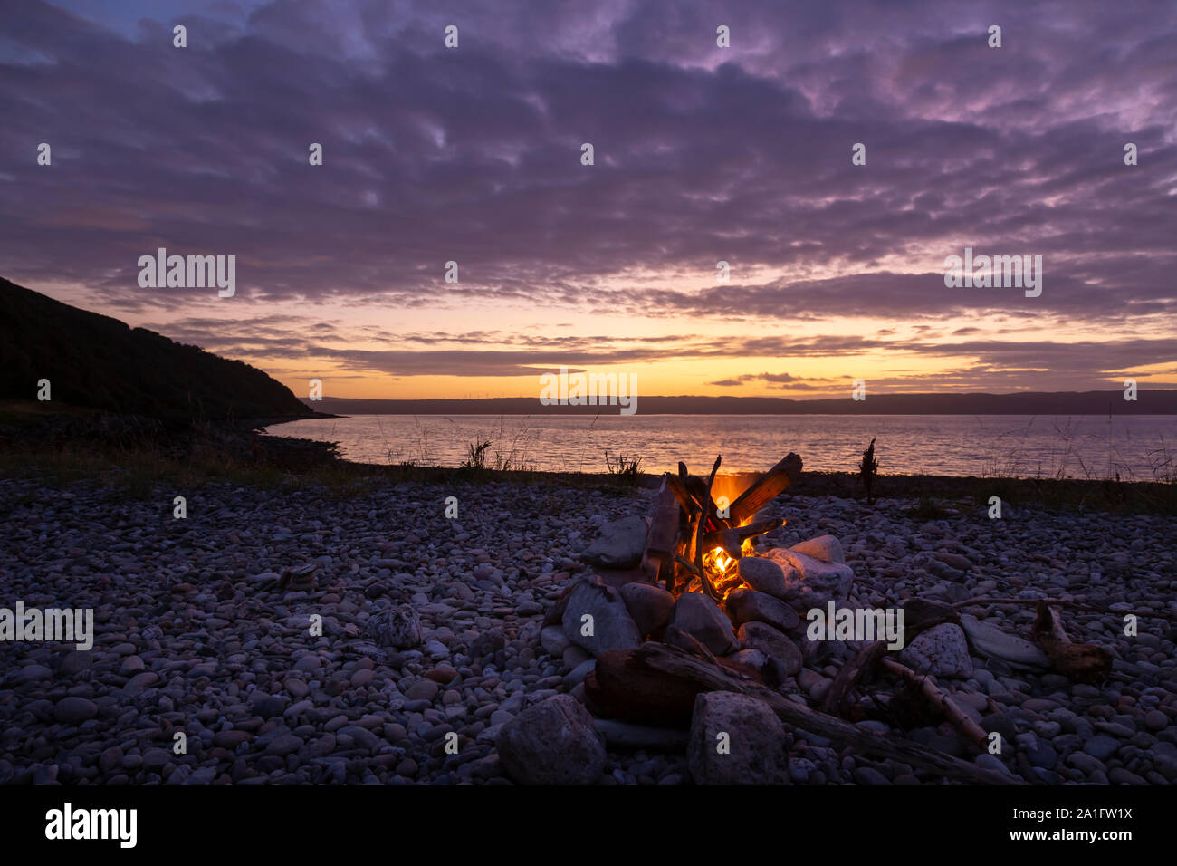 wild camping fire on arran beach Stock Photo - Alamy