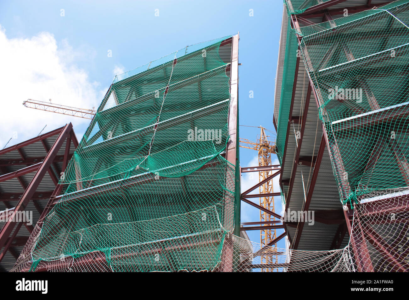 Under construction site netting mesh hi-res stock photography and ...