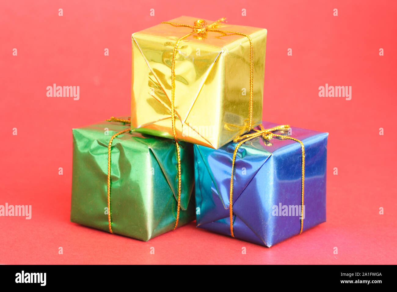 Three colorful gift boxes ribbon hi-res stock photography and images ...