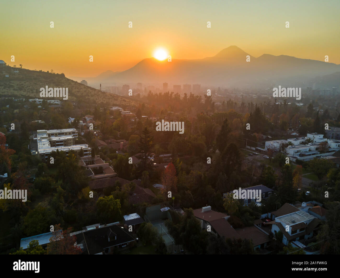 Amazing aerial views of Santiago de Chile city during sunset with the ...