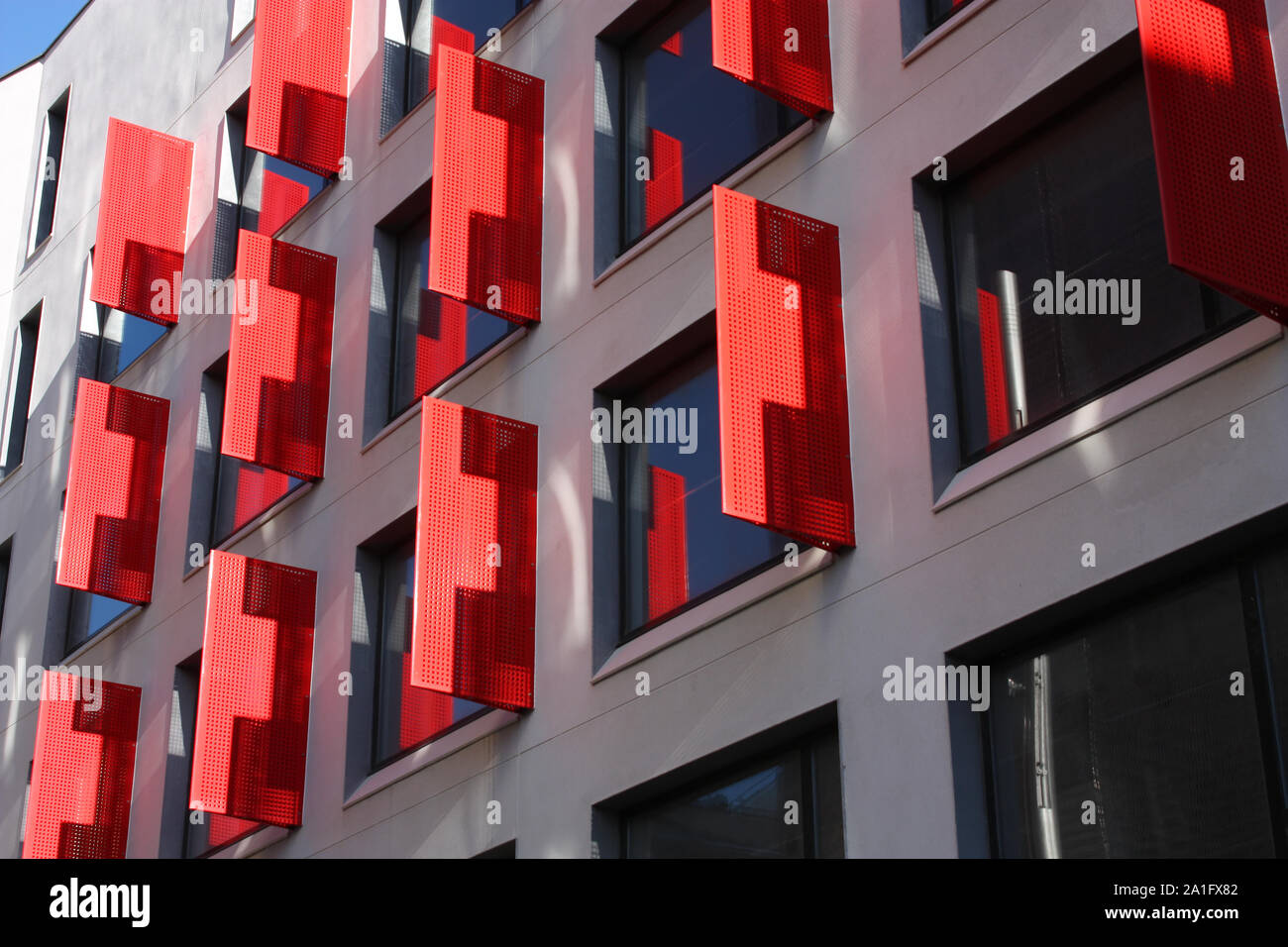 Building with metal screens to the sun. Light and shadow Stock Photo ...