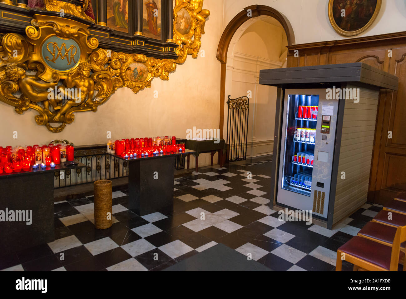 Candle vending machine in church Stock Photo - Alamy
