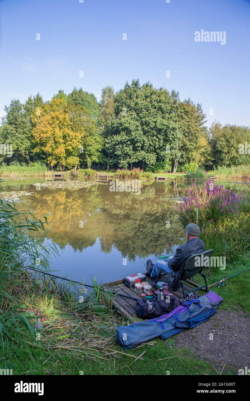 Angler at Stanners Pool along the Sankey Valley Trail at Winwick Quay ...