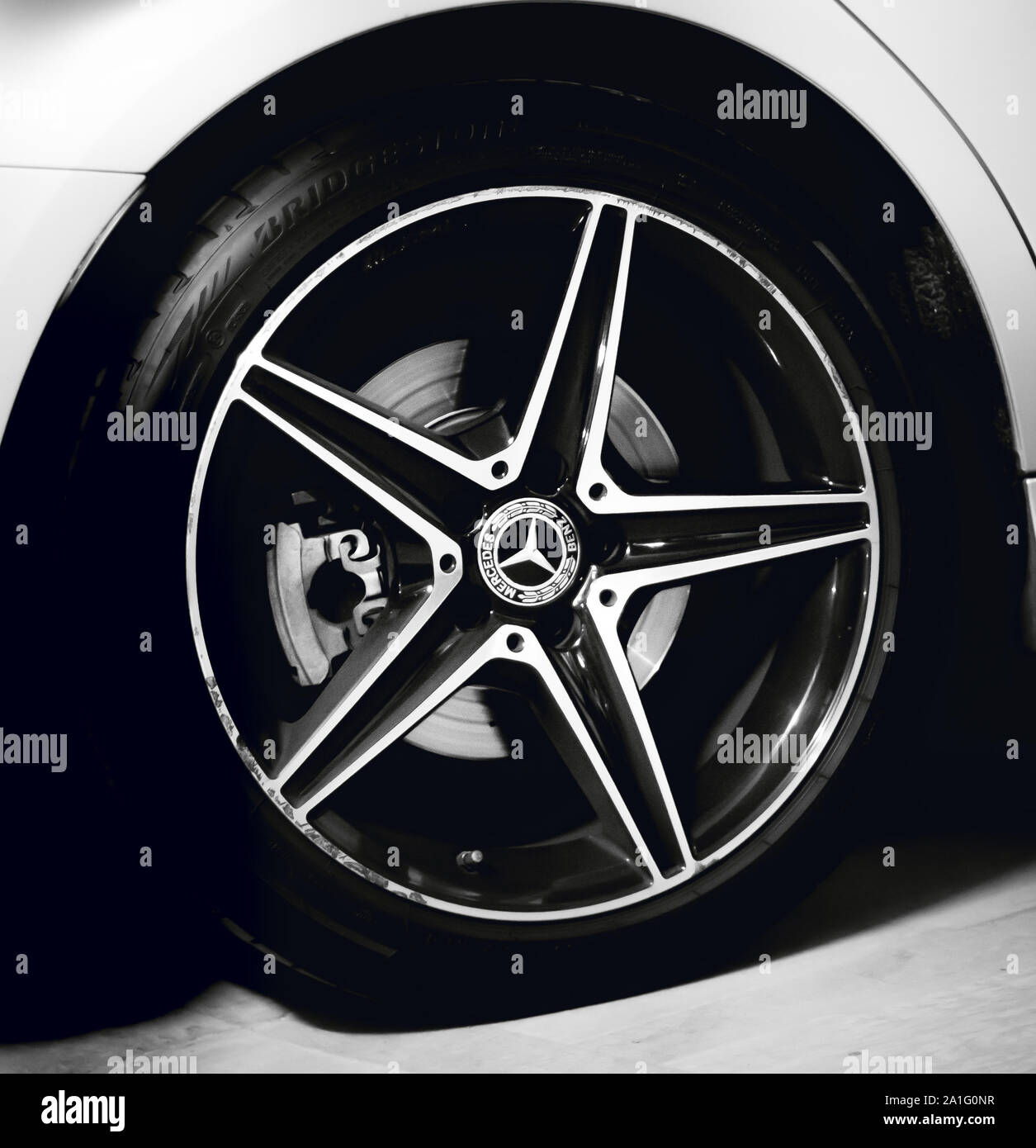 Photograph of a sports wheel of a mercedes benz car Stock Photo - Alamy