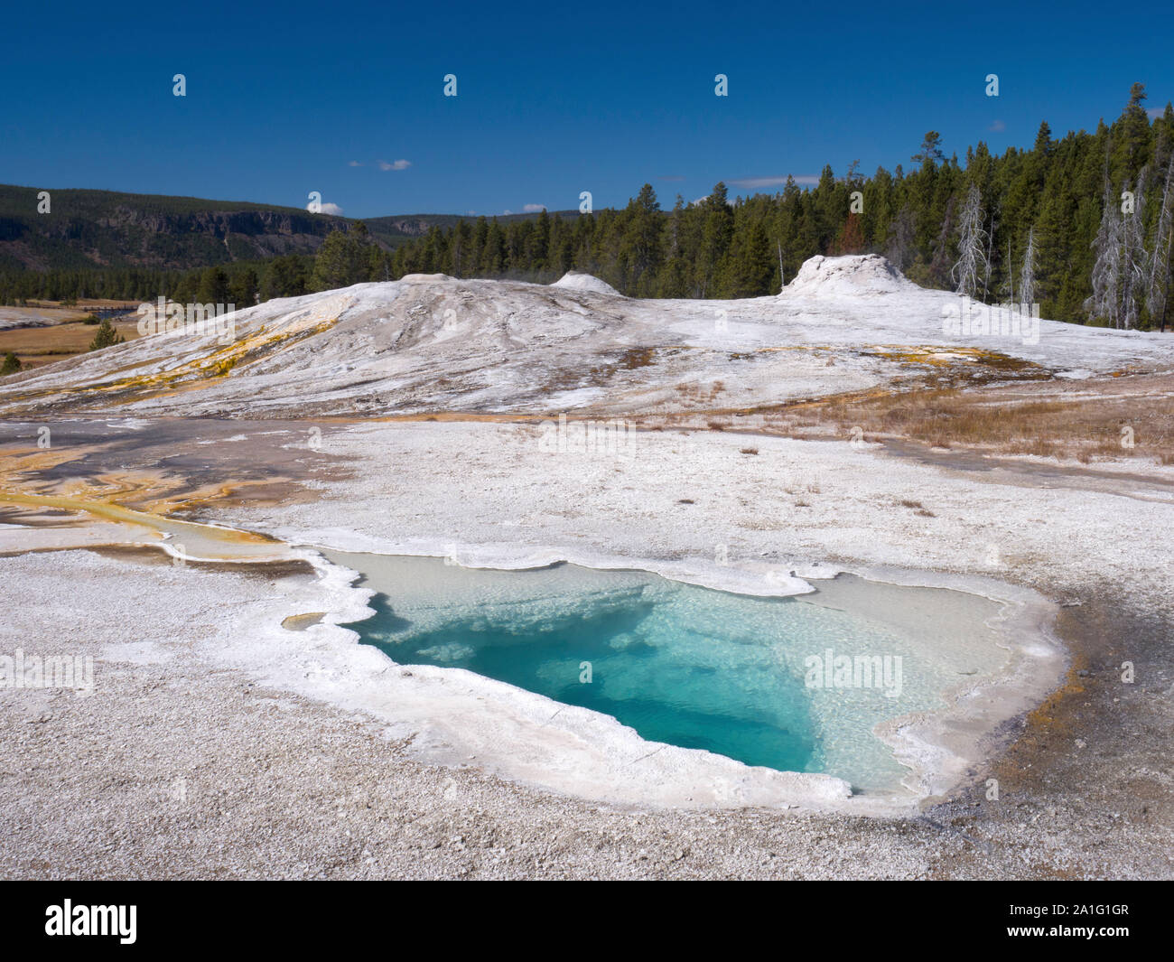 Heart Spring with Lion Geyser in background, Upper Geyser Basin ...