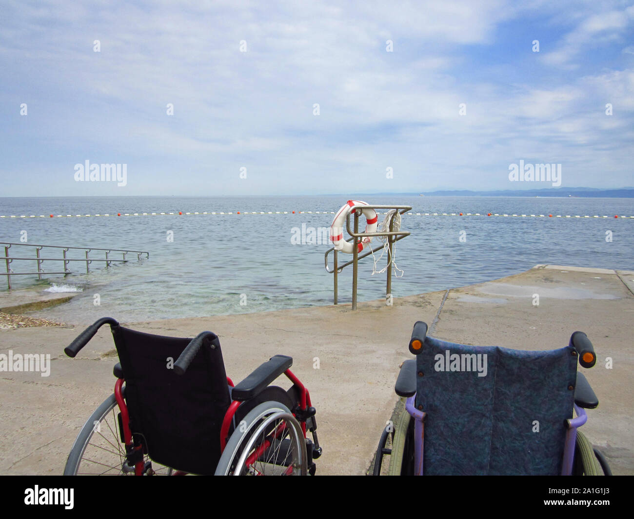 Wheelchairs on an accessible beach for transportation of people with ...