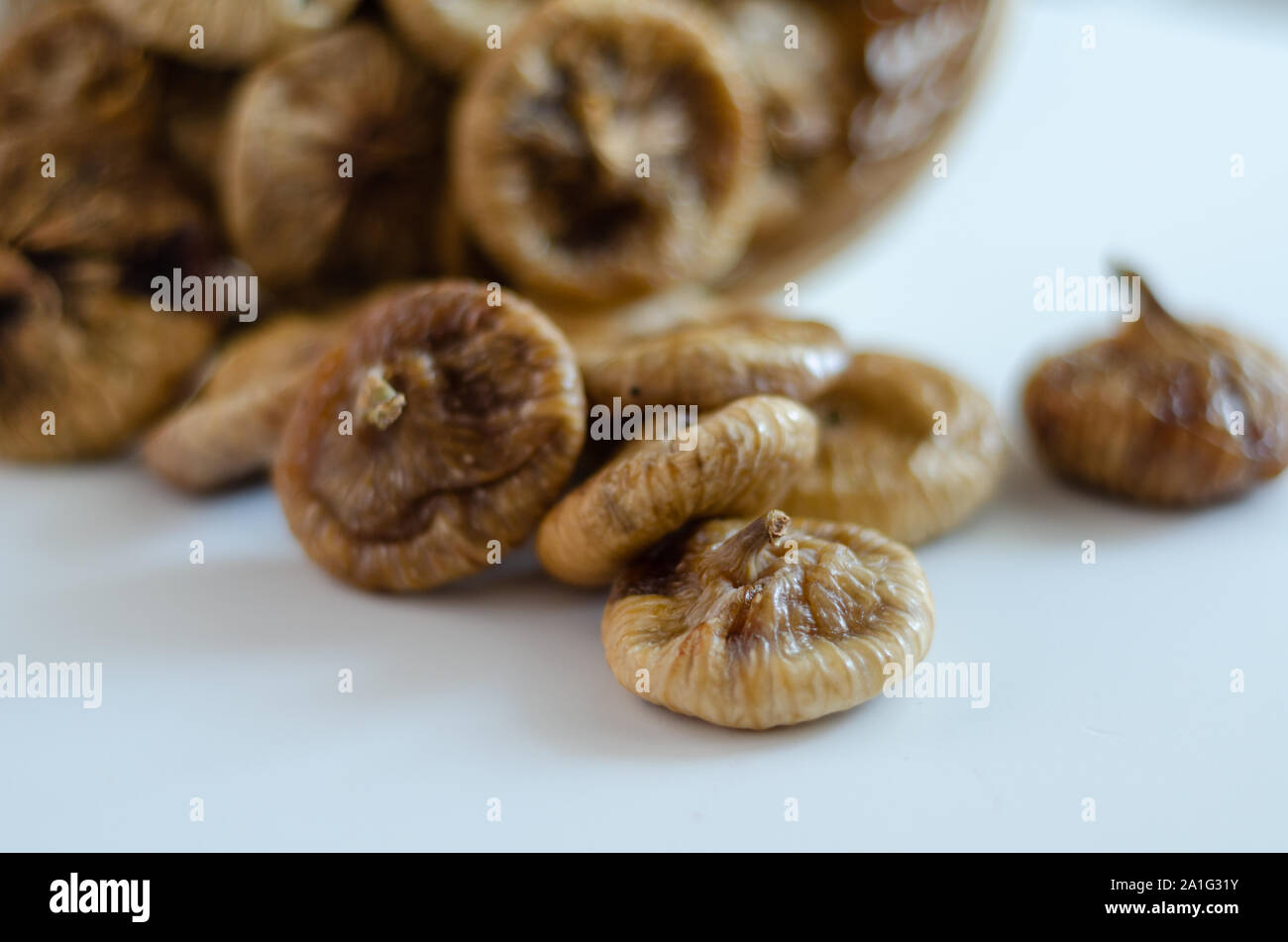 Dried figs are on white background,close up Stock Photo - Alamy