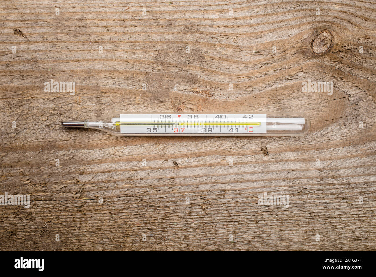 medical thermometer on the table of the old shabby boards Stock Photo ...