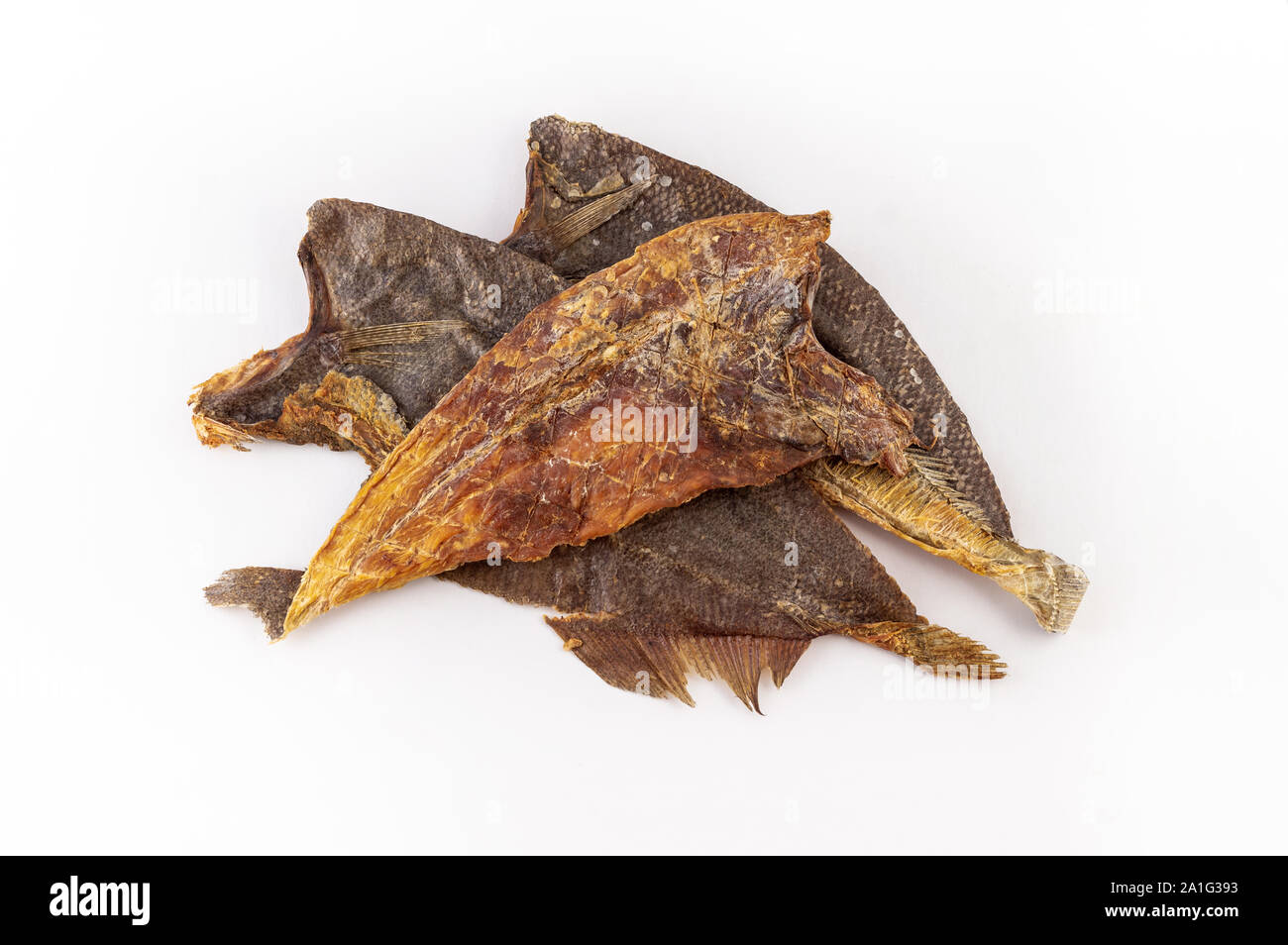 a group of dried fish on white background Stock Photo - Alamy