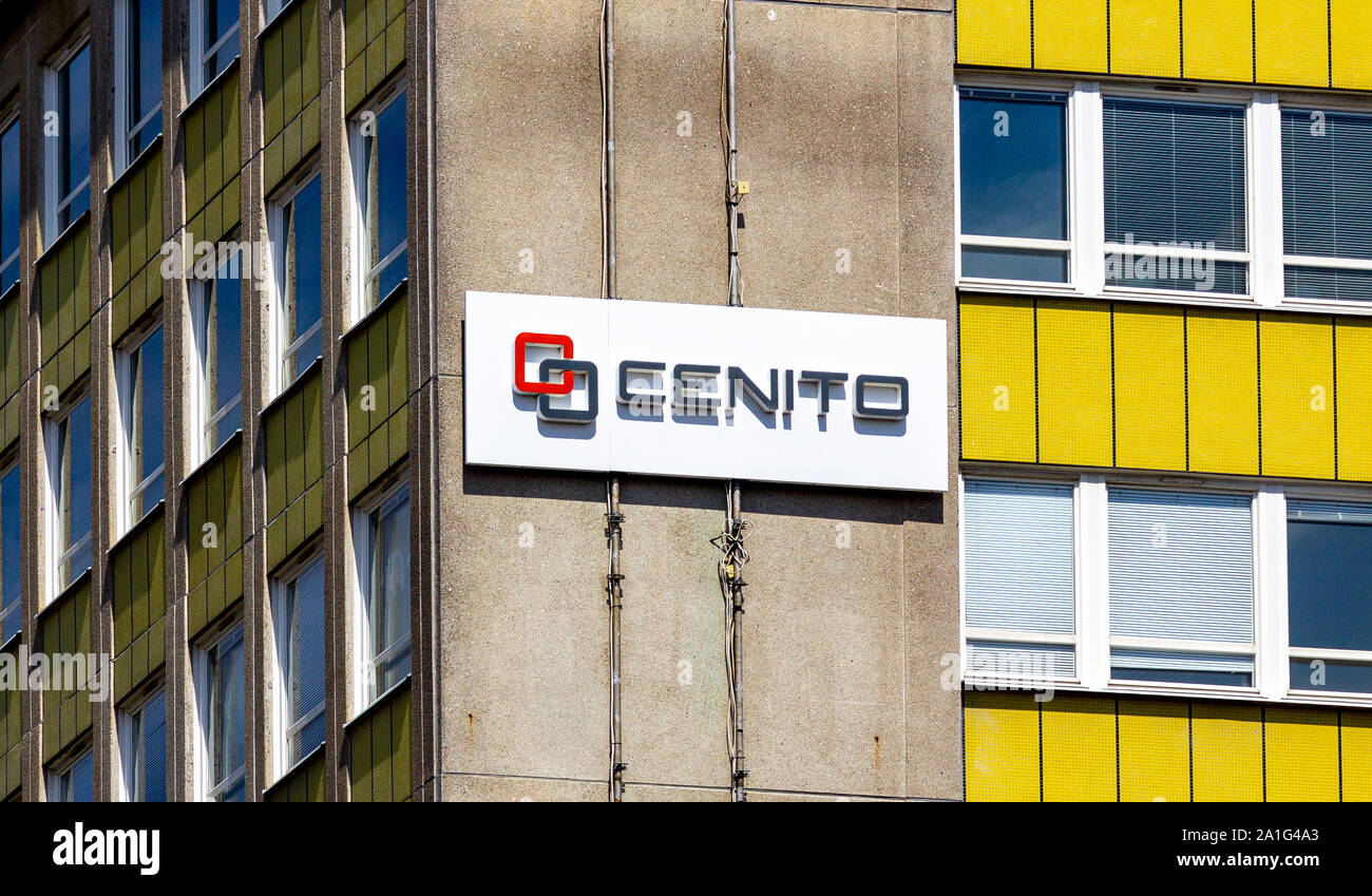 A white company logo sign with the name Cenito mounted on an office ...