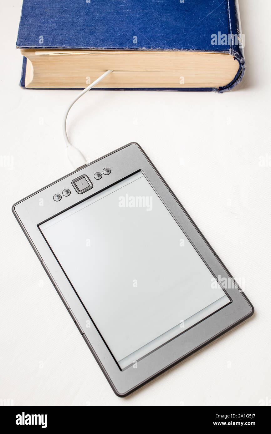 eBook connected to the old thick blue book with a cable, and download ...