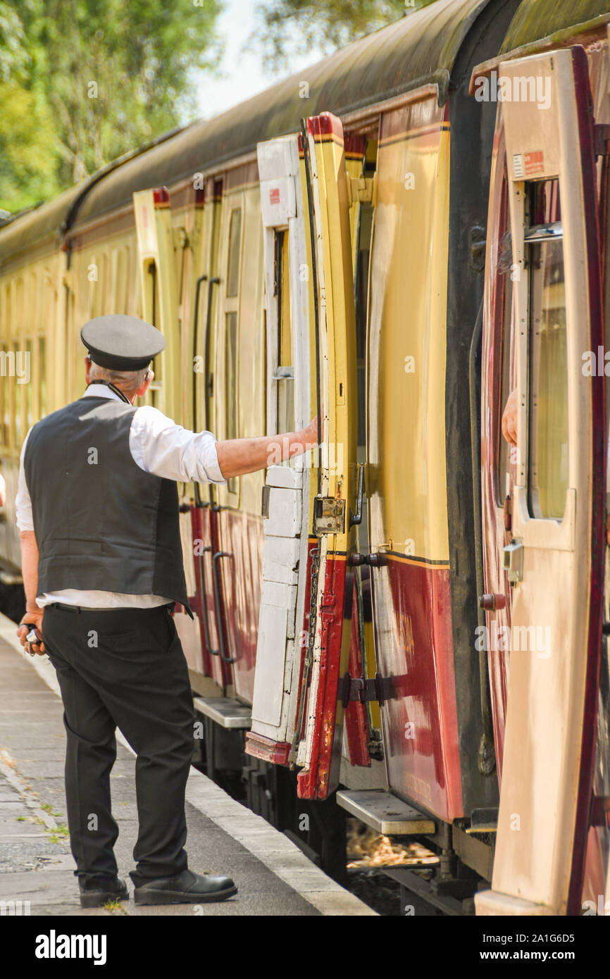 Platform railway guard hi-res stock photography and images - Alamy