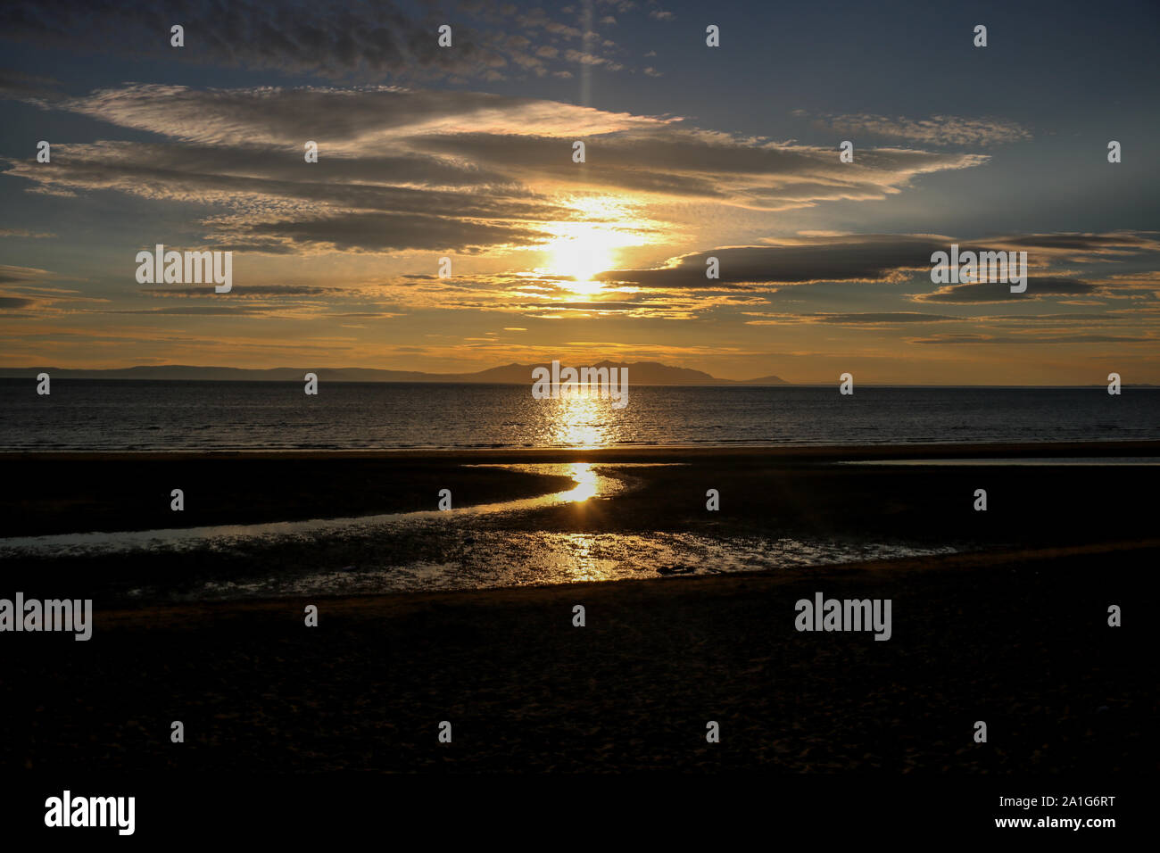 Isle of Arran from Ayr Beach at Sunset Stock Photo - Alamy