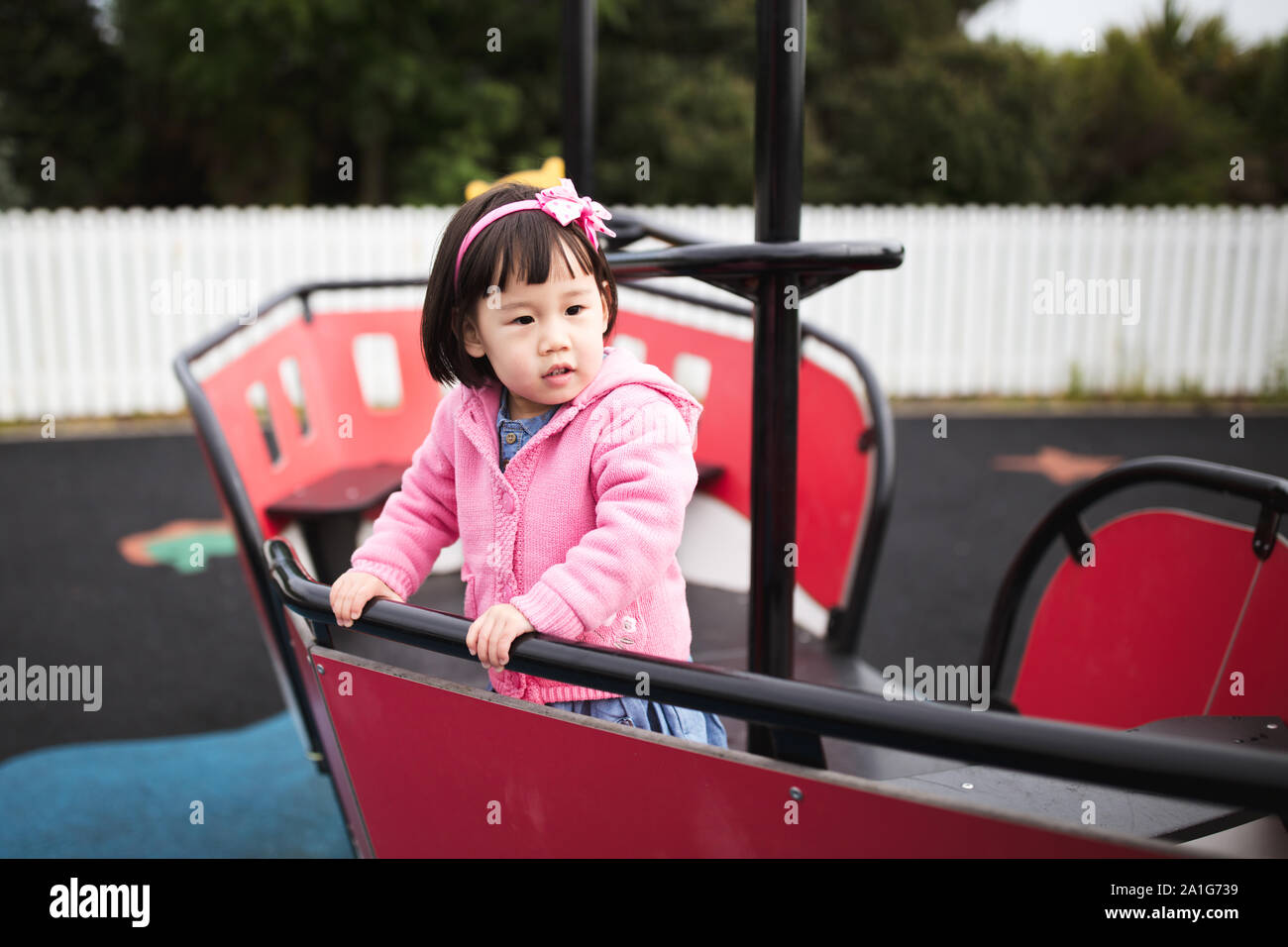 toddler girl play at Spring outdoor playground Stock Photo - Alamy
