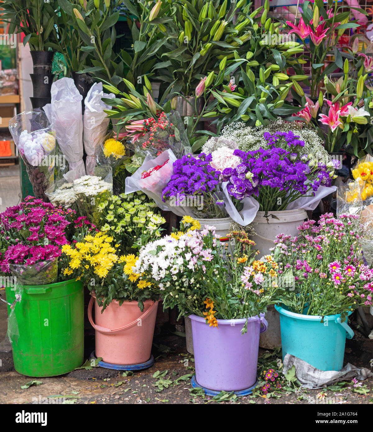 Fresh Flowers Bouquets in Buckets at Florist Shop Stock Photo - Alamy