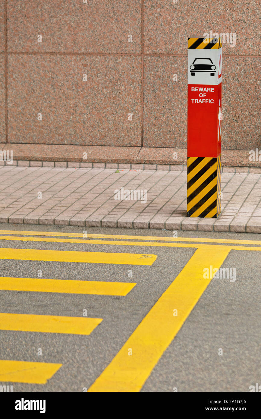 Beware of Traffic Sign Post at Crosswalk Stock Photo - Alamy