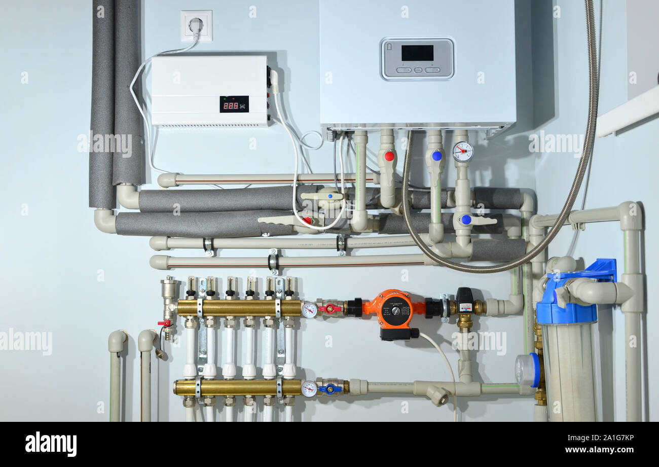 Pump with a thermometer for a water underfloor heating system at home ...