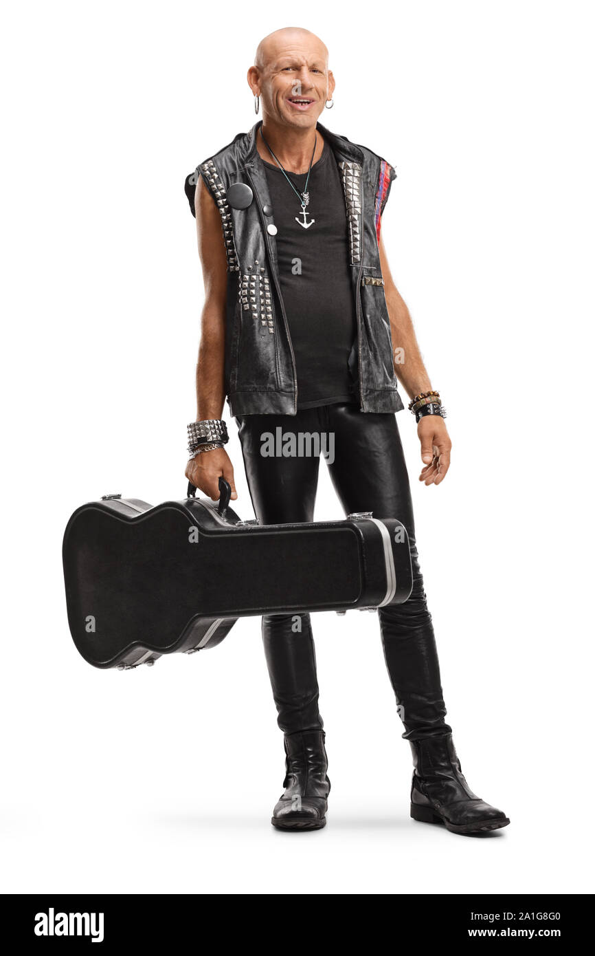 Full length portrait of a rock musician in leather outfit with a guitar ...