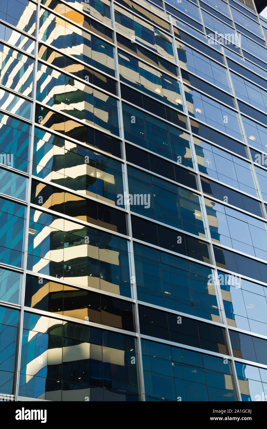 Modern glass reflection on modern building Stock Photo - Alamy