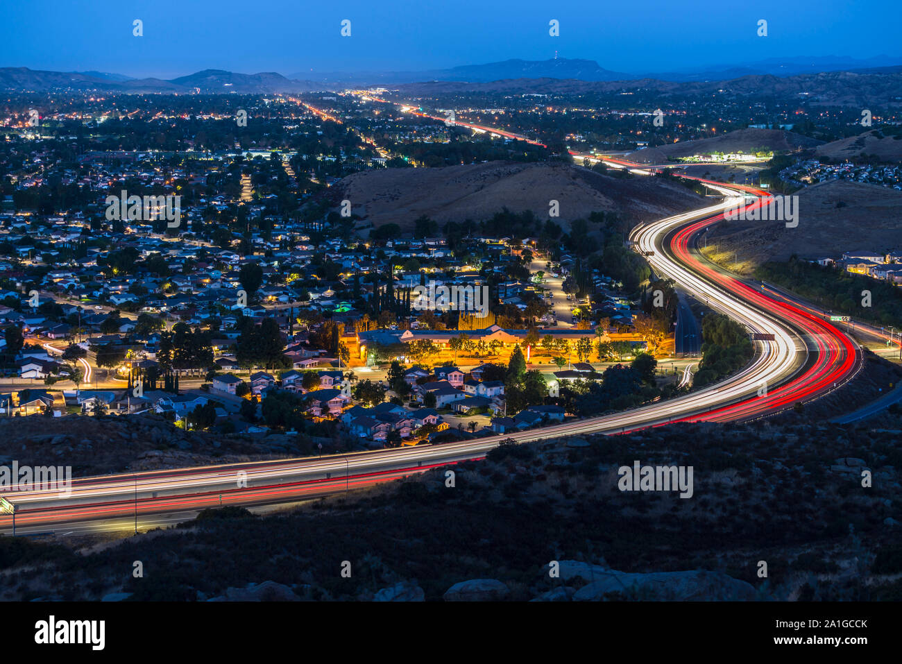 Twilight view of commuter freeway traffic in suburban Simi Valley near ...