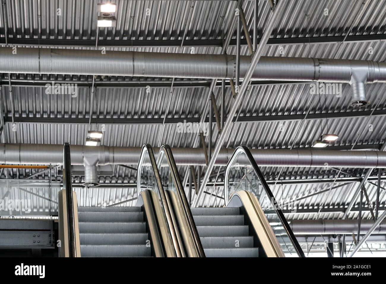 Inside roof of metal hall, elevators leading to second floor Stock ...