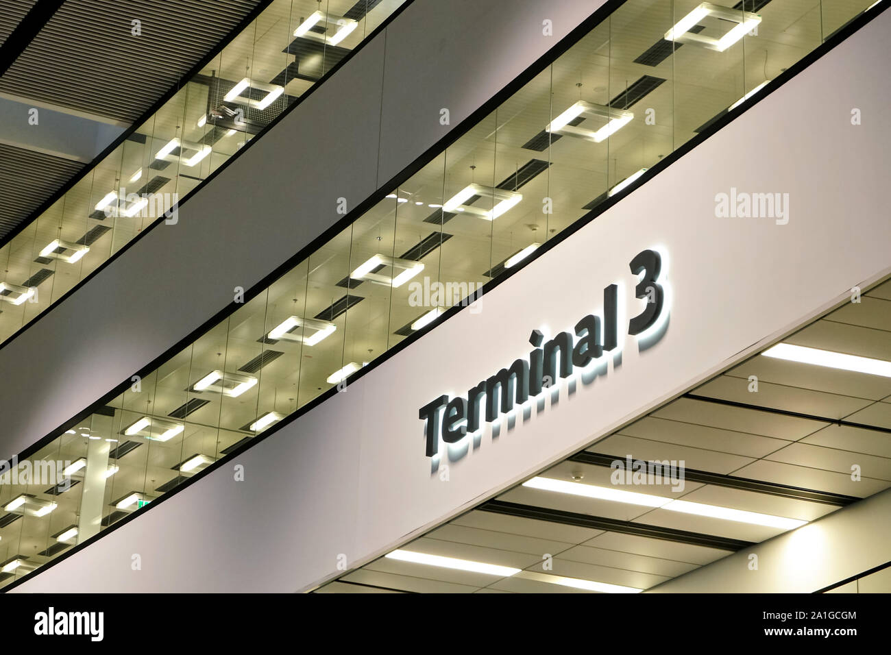Black Terminal 3 sign in airport departure hall Stock Photo - Alamy