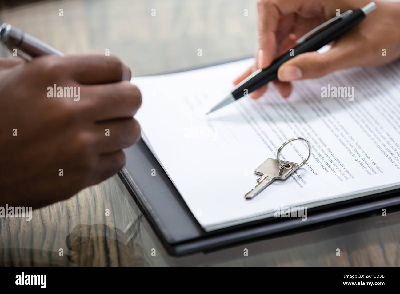 Real estate agent signing house hi-res stock photography and images - Alamy