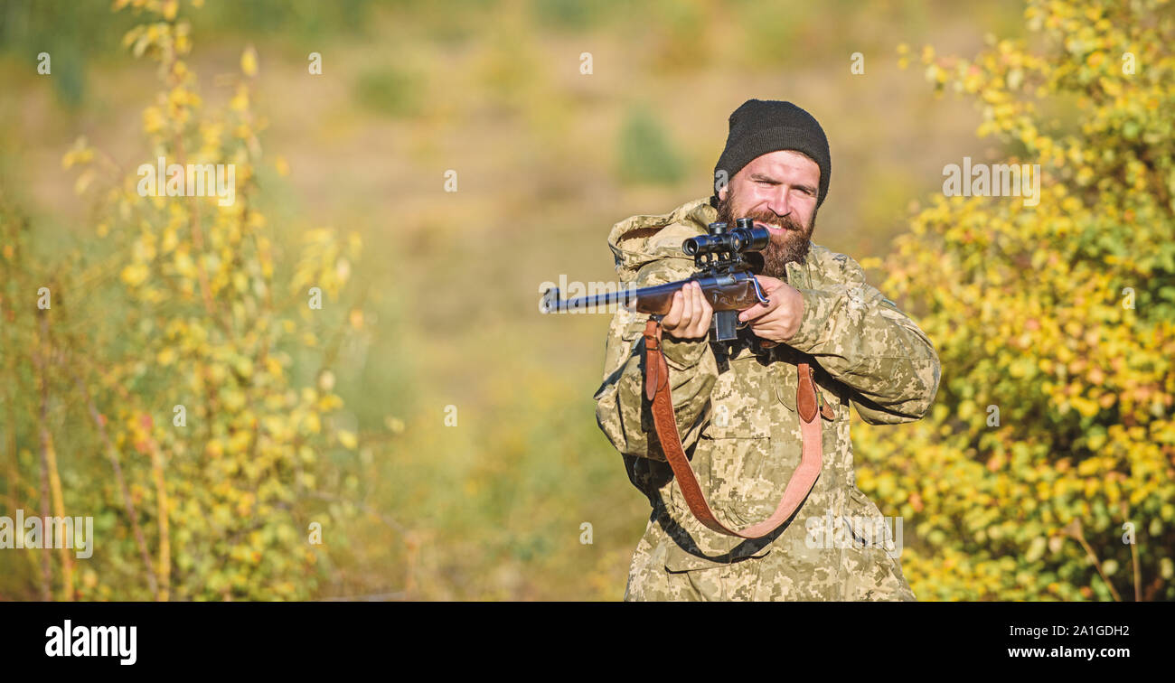 Focus and concentration of experienced hunter. Hunting masculine hobby ...