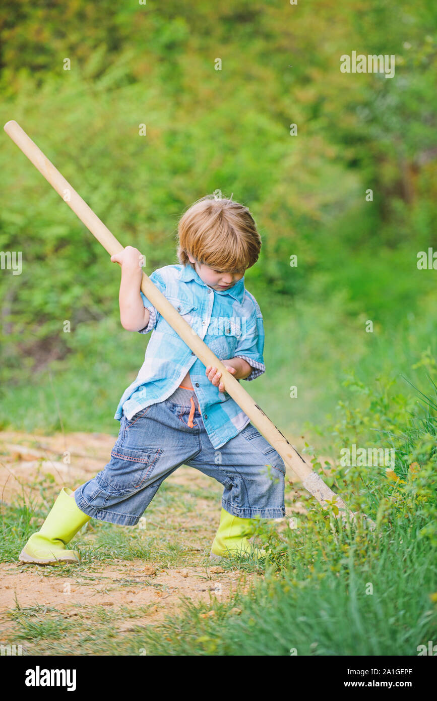 Child boy digging treasure in hi-res stock photography and images - Alamy