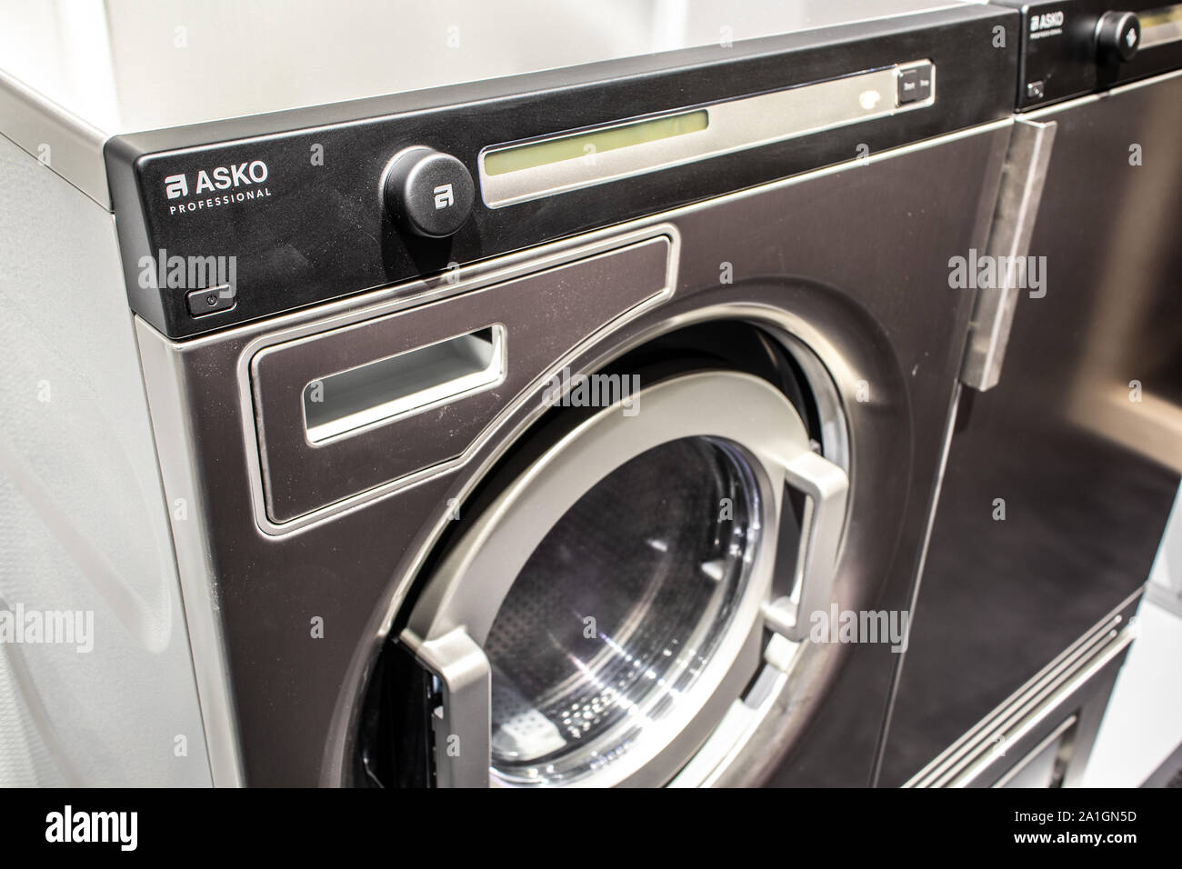 Berlin, Germany, Sep 2019 Asko washing machine tumble dryer on display ...