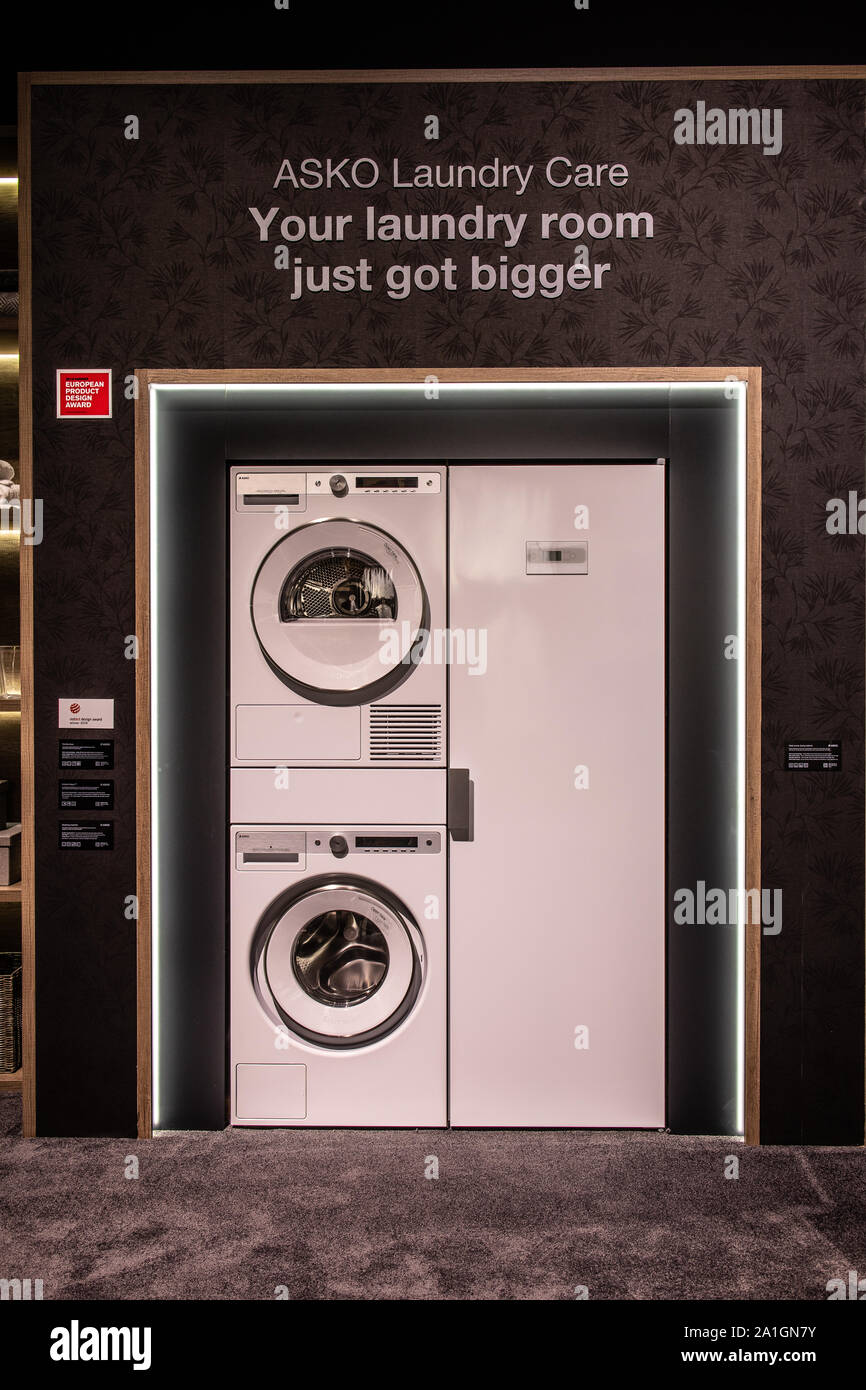 Berlin, Germany, Sep 2019 Asko washing machine tumble dryer on display ...