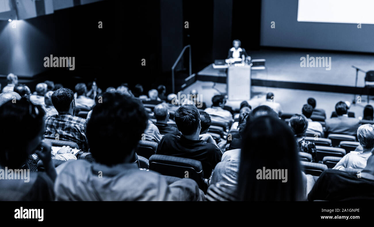 Business speaker giving a talk at business conference event Stock Photo ...