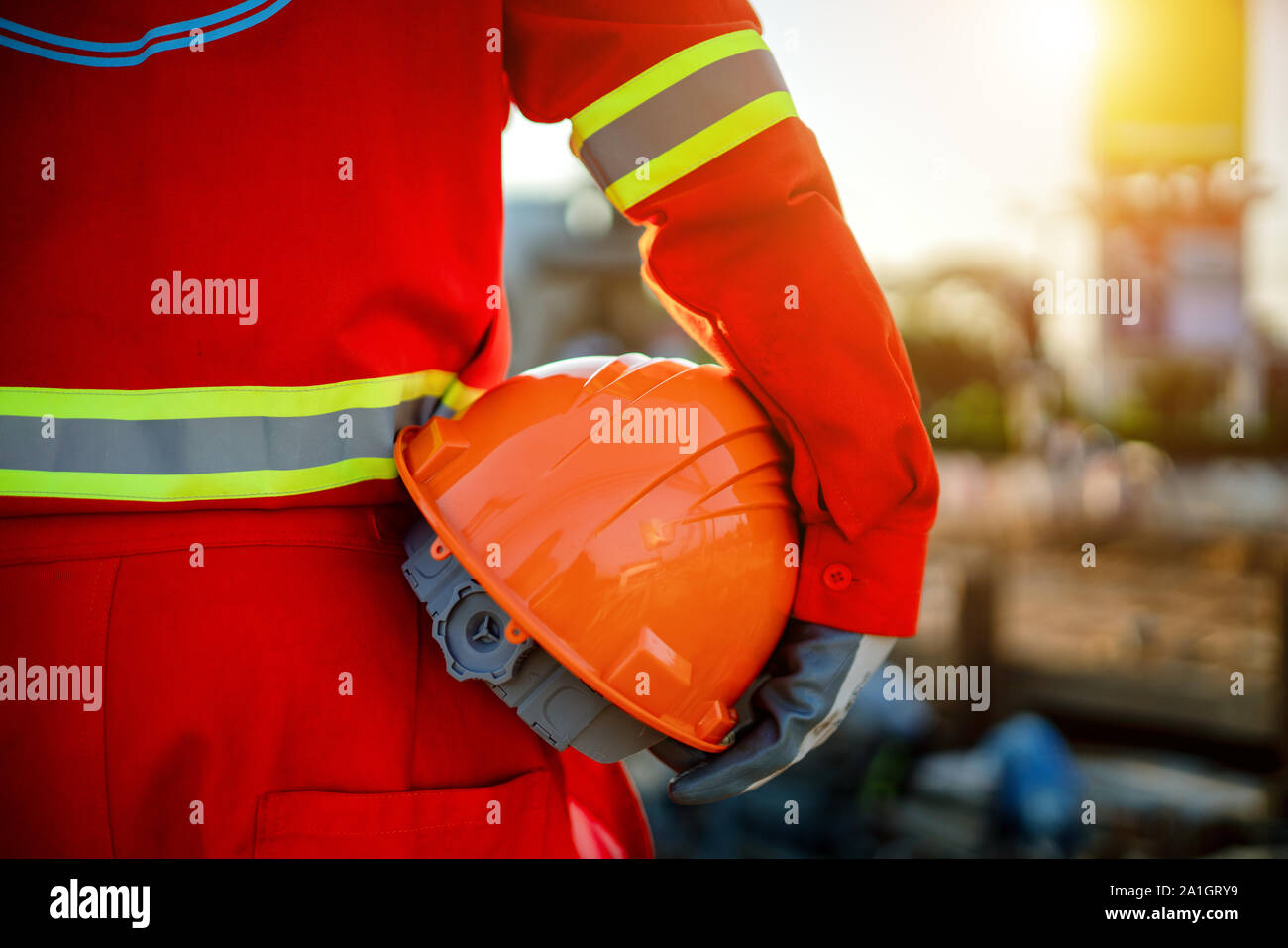 Engineer holding Safety Helmet working in the construction site Stock ...