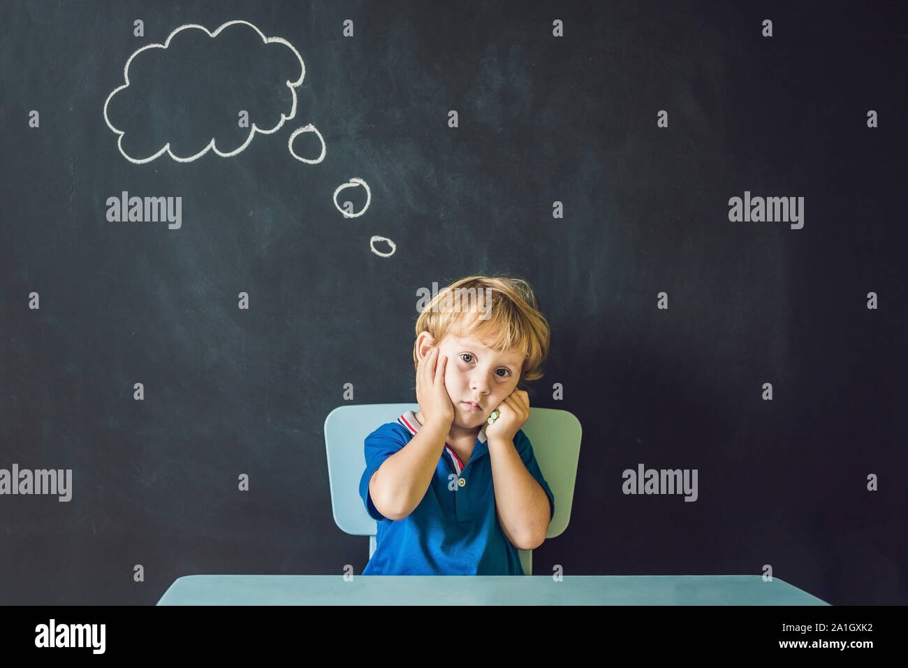 Closeup portrait of Cute little boy thinking deeply about something ...