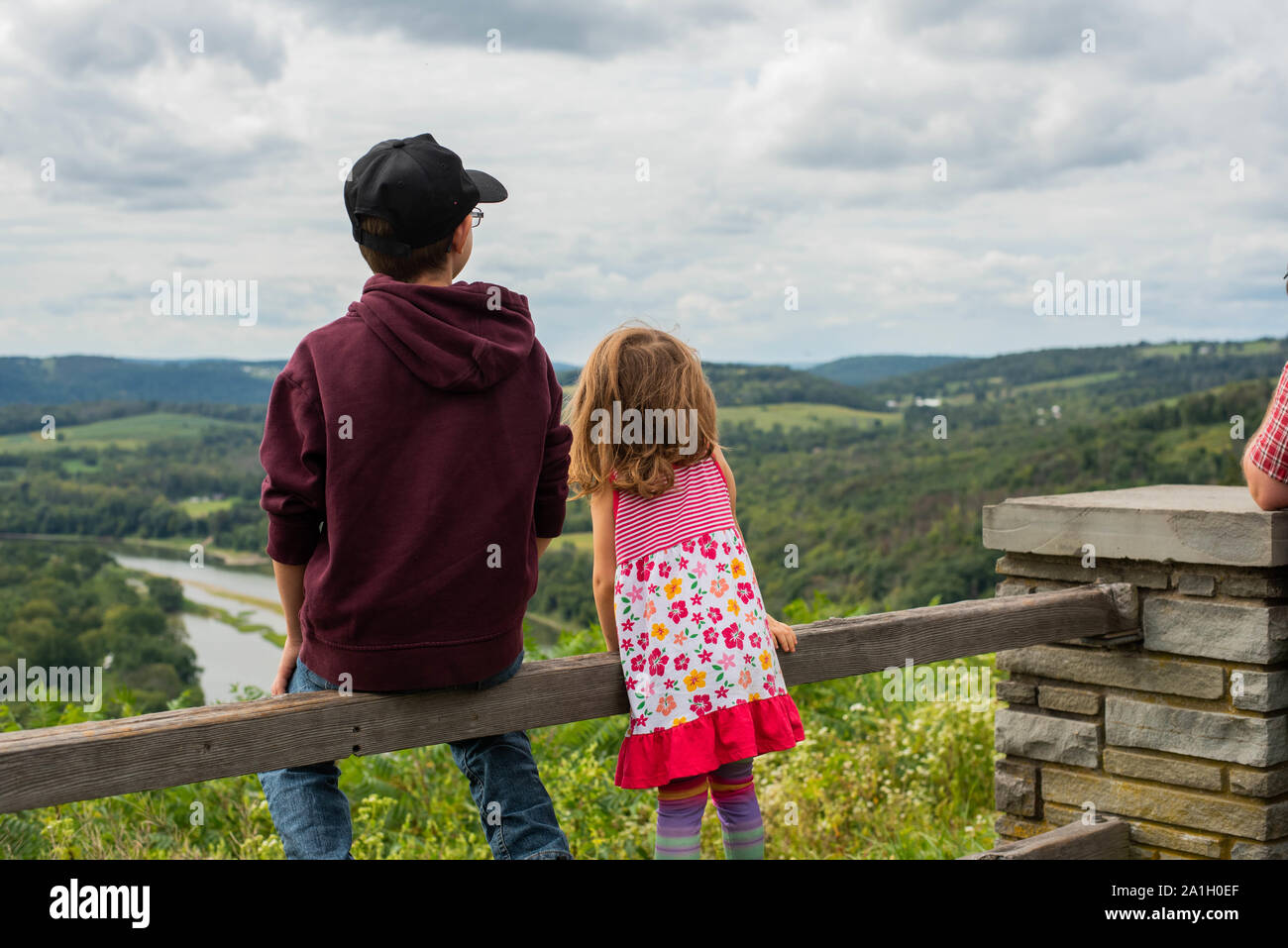 Two people look out over the vast green landscape in rural Pennsylvania ...