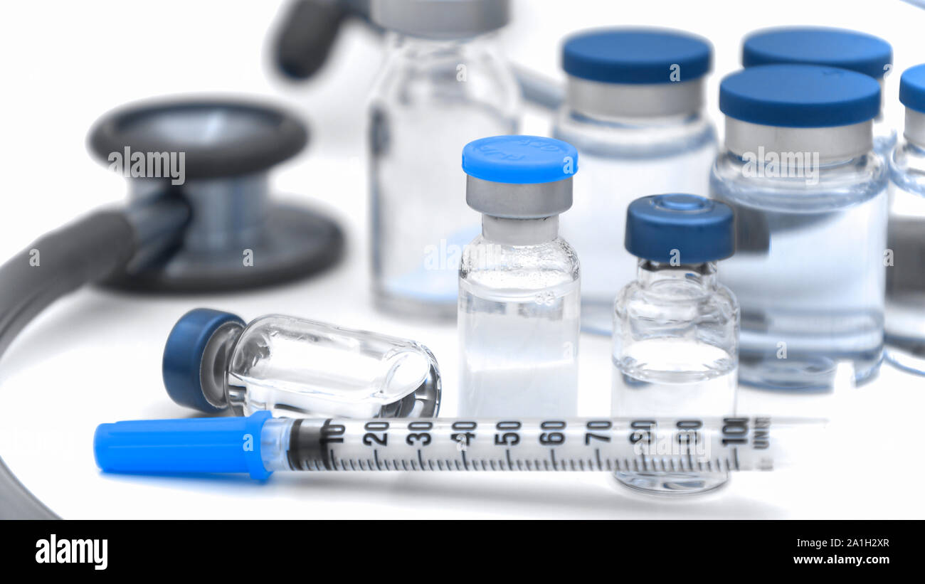 Tuberculin Syringe and Sterile Vial Filled with Medication Solution. An ...