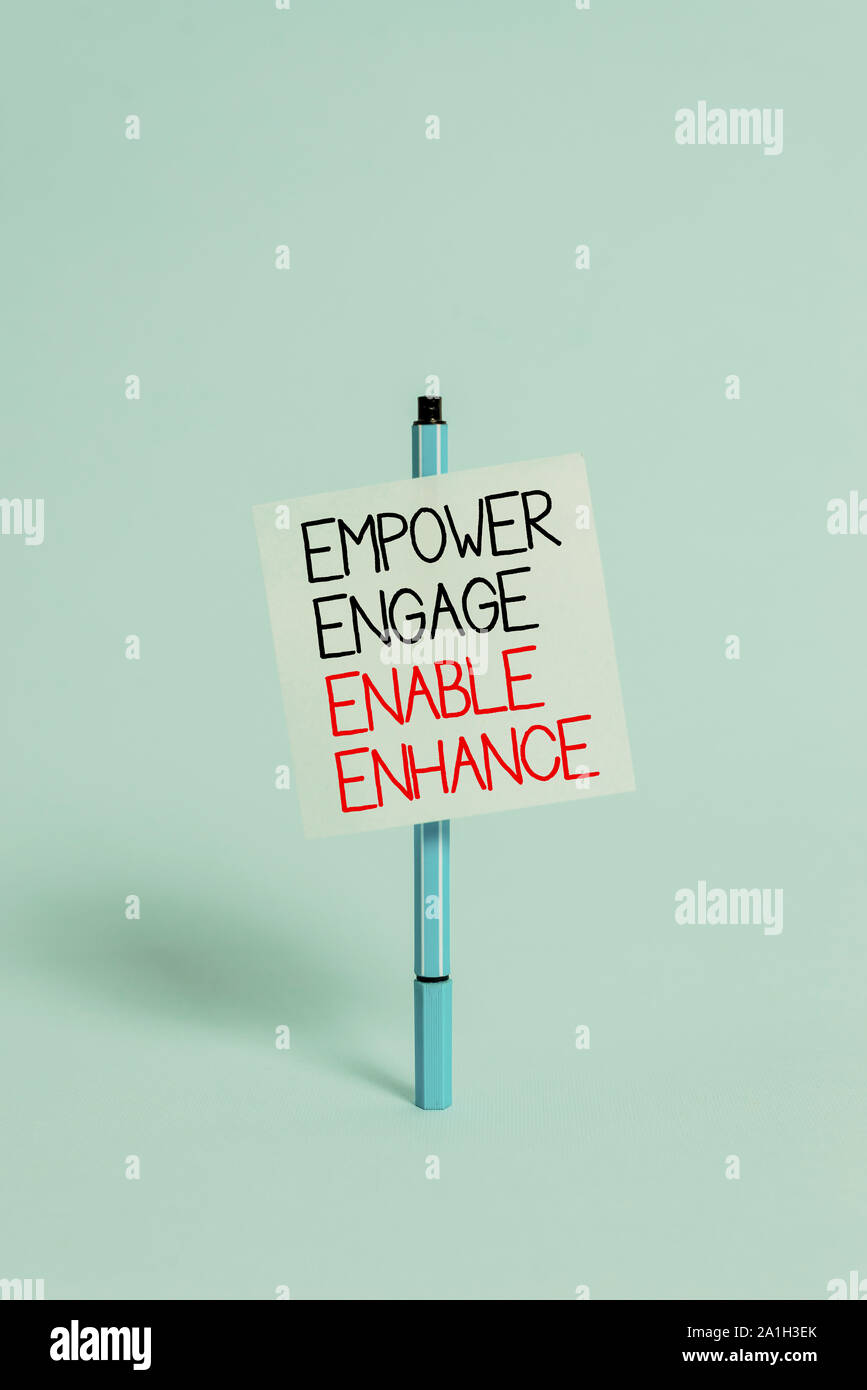 Text sign showing Empower Engage Enable Enhance. Business photo ...