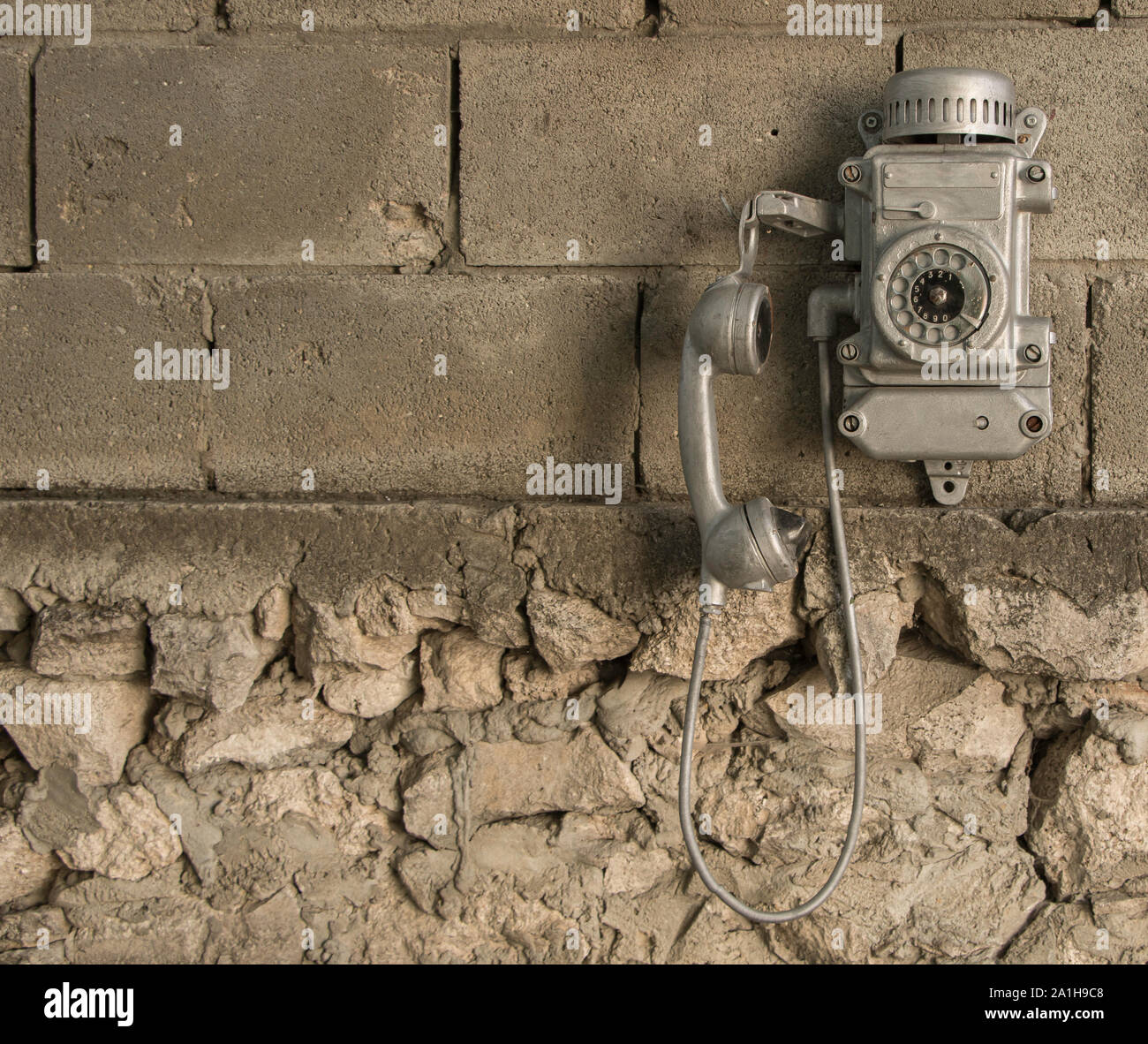 Antique phone with disk. Retro. Metal casing Stock Photo - Alamy