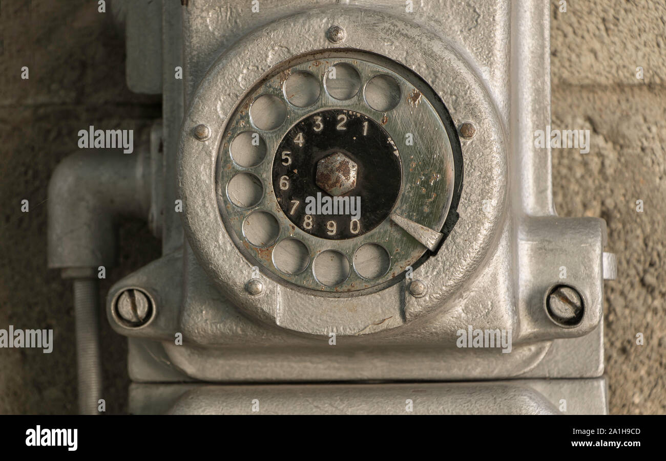 Antique phone with disk mechanical close up. Metalic Stock Photo - Alamy
