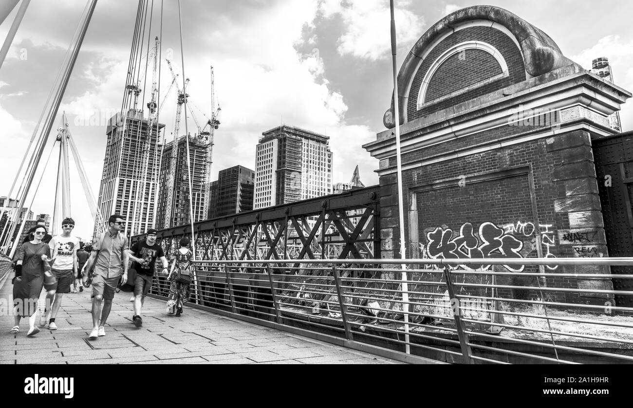 People walking alongside train tracks in waterloo, London England Stock ...