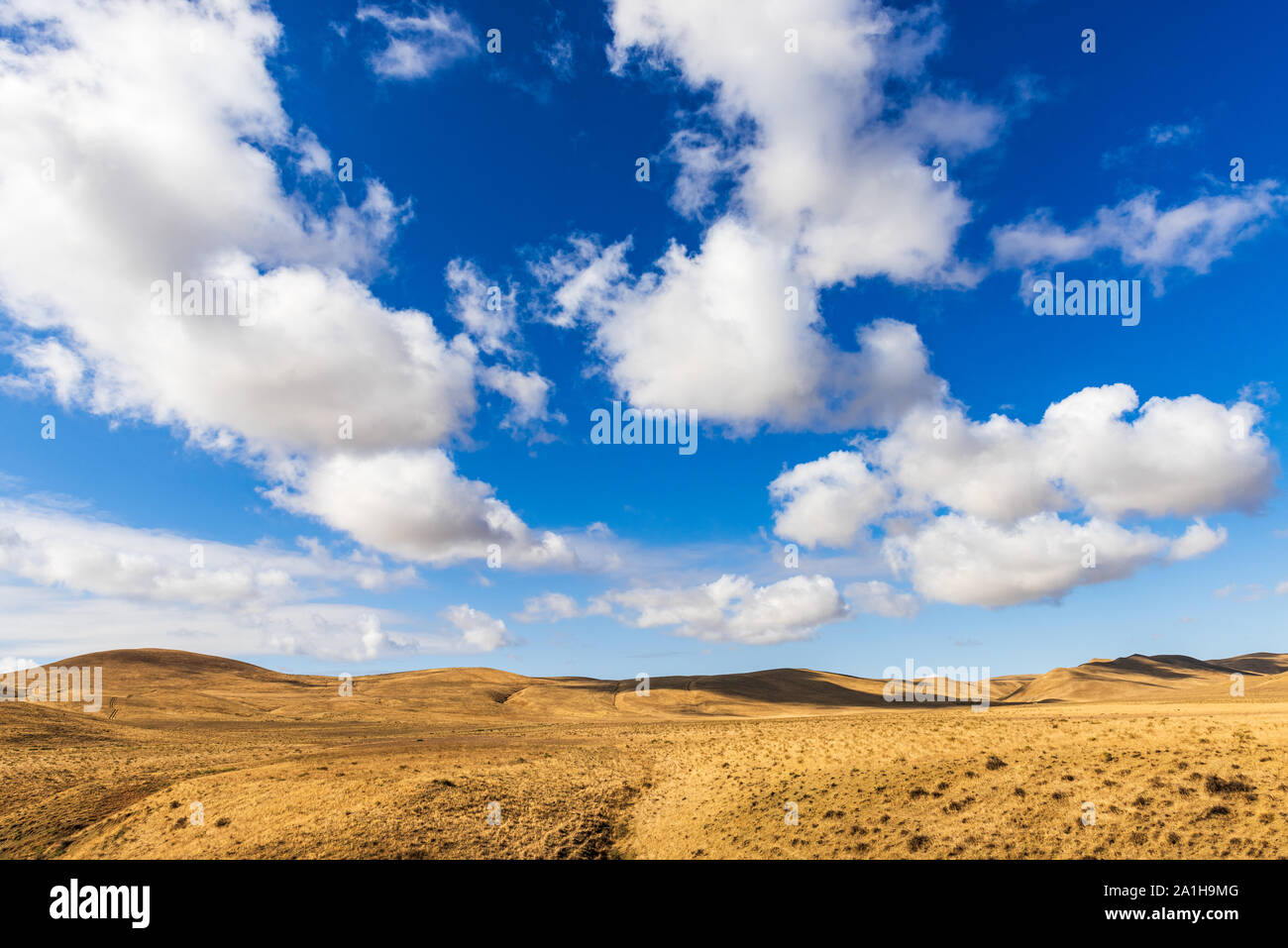 Cumulus clouds over prairie hi-res stock photography and images - Alamy
