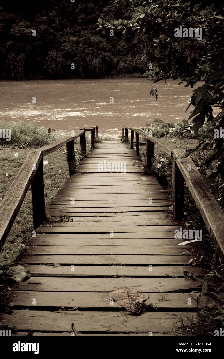 Old wooden bridge in old style photo in portrait orientation Stock ...
