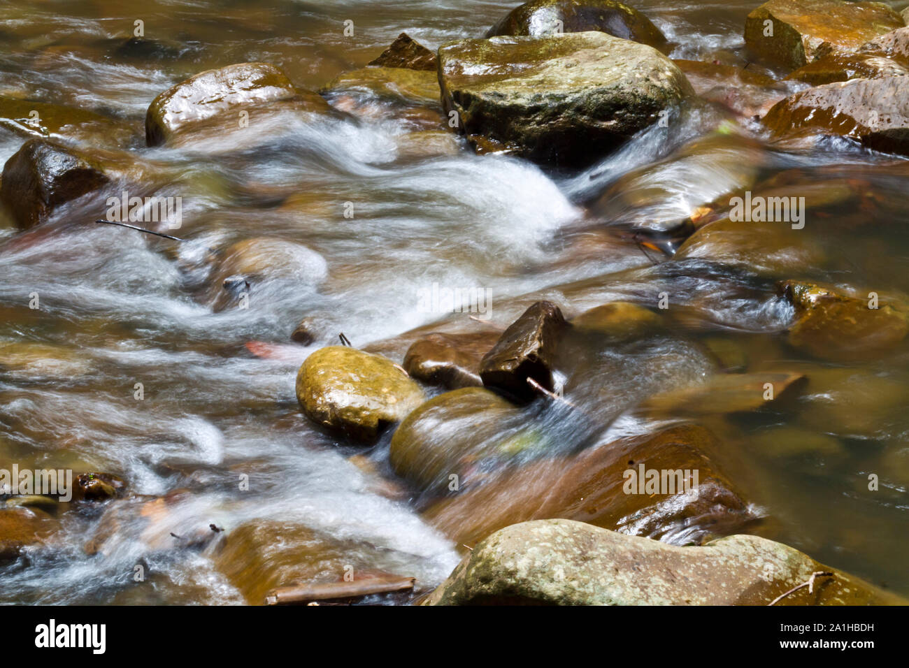 river flow captured by slow shutter release Stock Photo - Alamy
